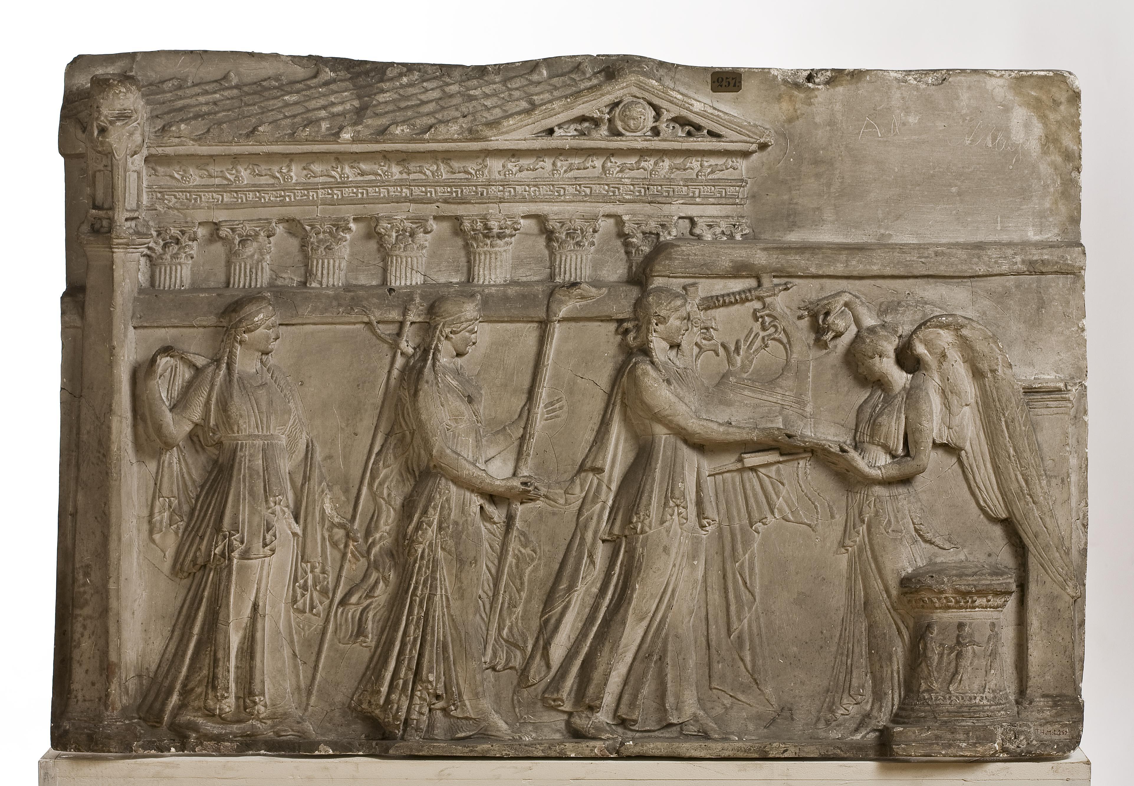 Leto, Diana, and Apollo with a zither walking in procession towards ...