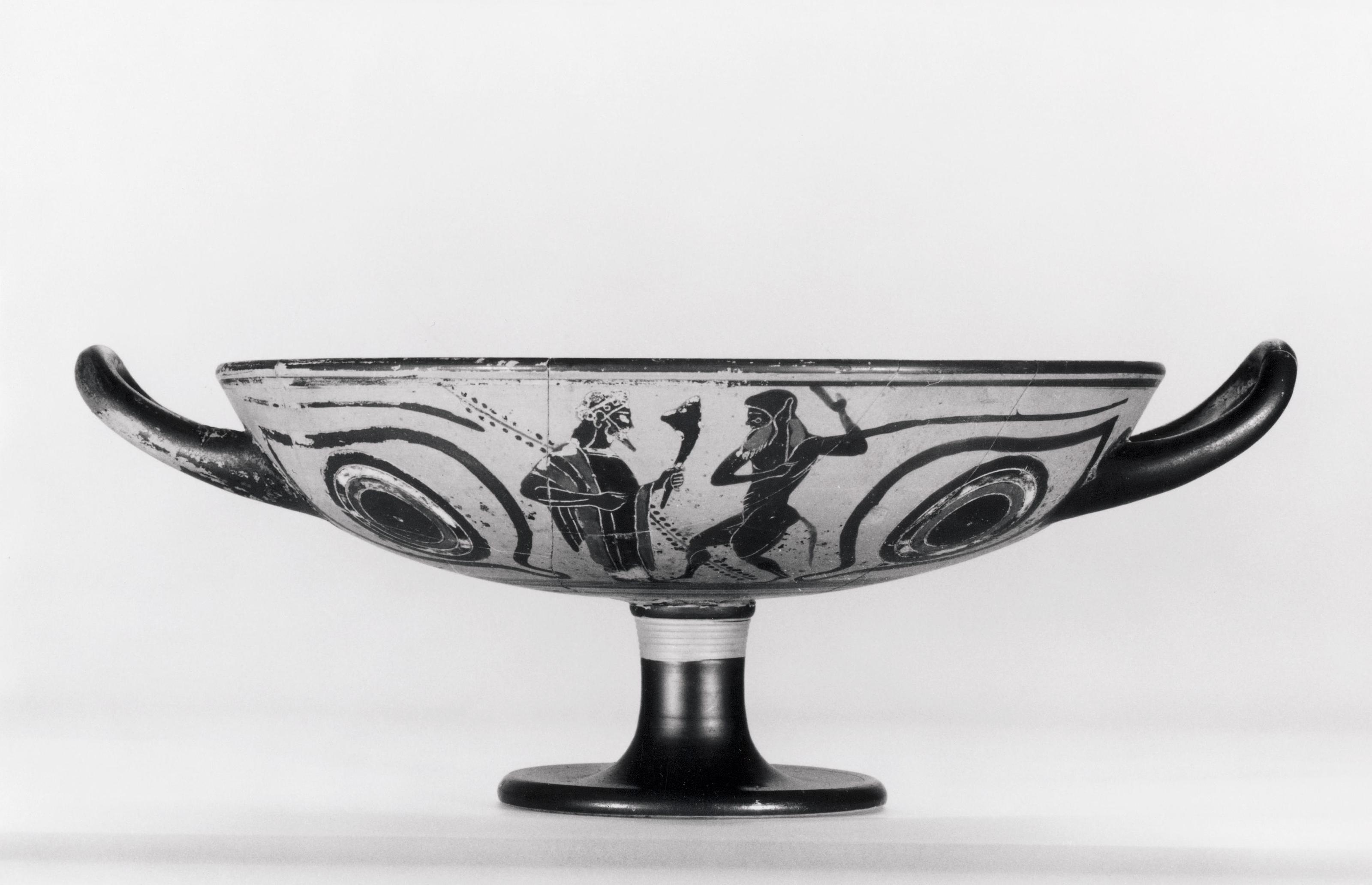 Kylix with eyes, Dionysus, and a silenus (A) and Dionysus, dancing (B ...